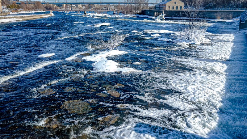 Water is Rushing Over the Edge in Winter Stock Photo - Image of covered ...