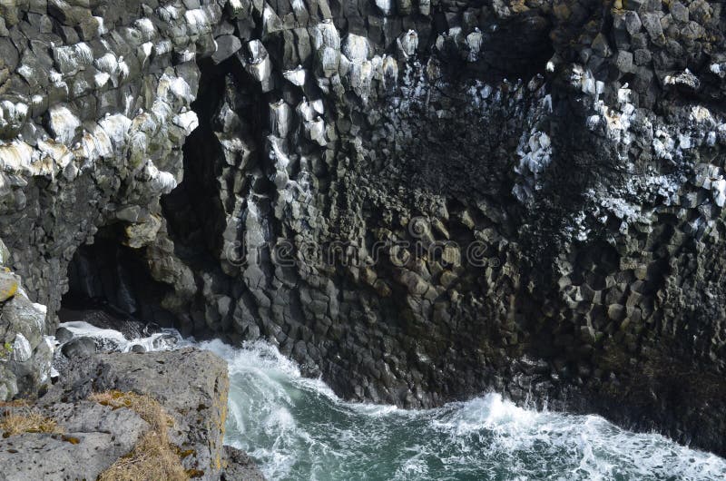 Water Rushing into a Basalt Column Cavern in Iceland Stock Photo ...