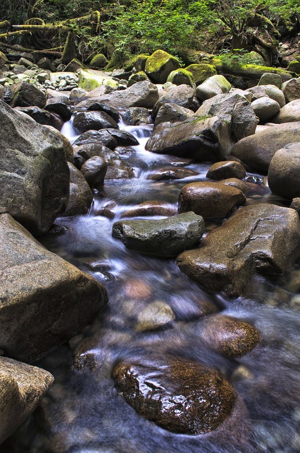 Water Rushing Down Over Rocks Stock Photo - Image of flowing, outdoor ...