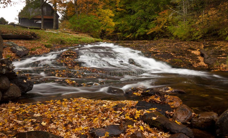 Water rushing down river stock photo. Image of boulder - 16326514