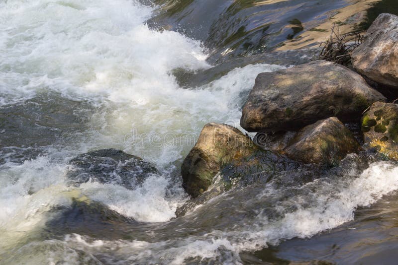 Water Rushing Over Small Boulders Stock Image - Image of stream, river ...