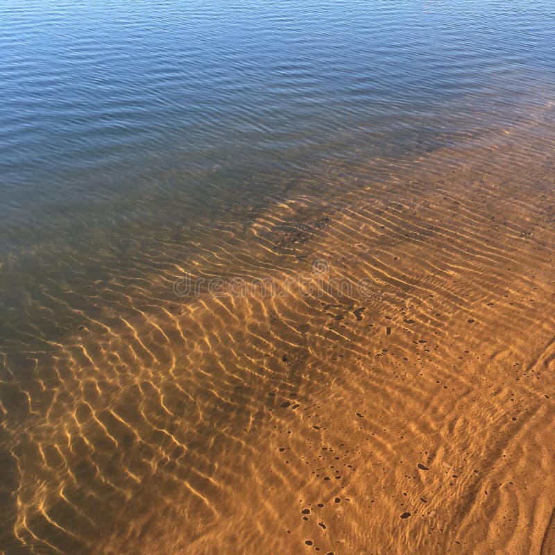 At the water`s edge stock image. Image of sand, michigan - 83196181