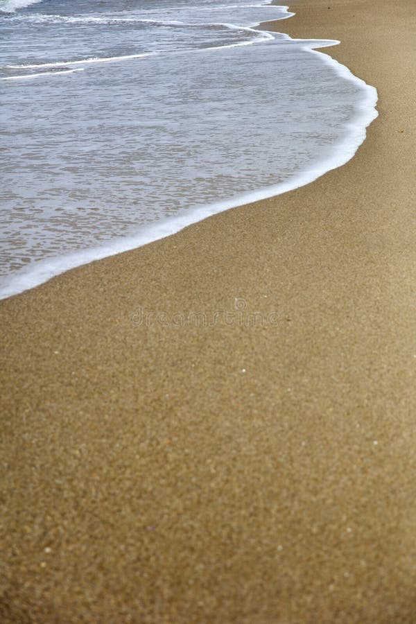 Water and Sand Beach Detail Stock Image - Image of coastline, beach ...