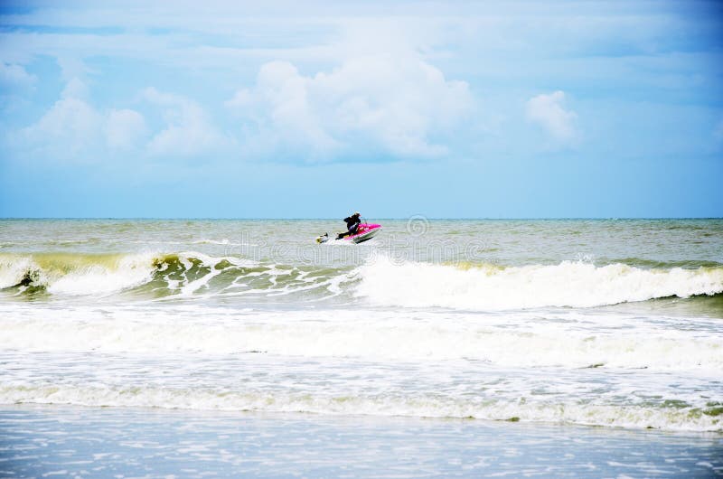 Water scooter on the beach stock image. Image of season - 57323193