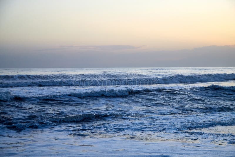 Water of Sea with Waves and Yellow Sky at Sunset Stock Image - Image of ...