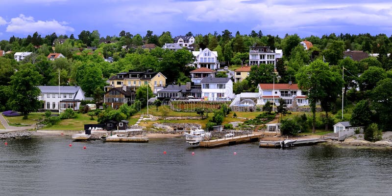 Water side houses stock image. Image of grass, house - 47961145