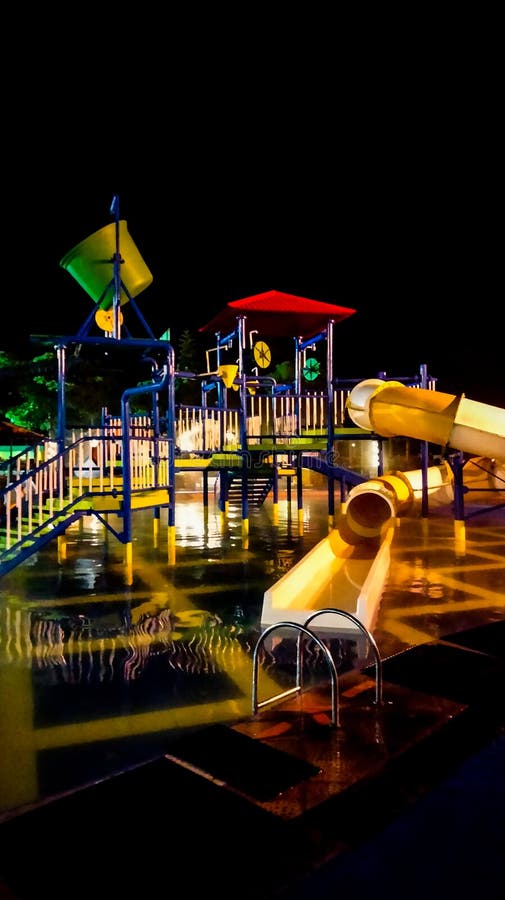 Water slide in the night stock photo. Image of water - 278036406