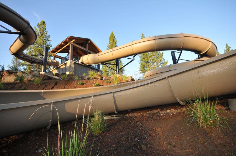 Water Slide into a Pool from within the Tube Stock Photo - Image of ...