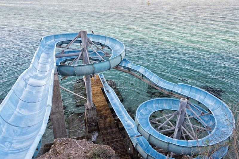 Water slide by the sea stock image. Image of pool, splash - 50336525