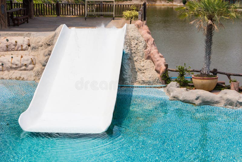 Fun Water Slider in the Pool. Stock Photo - Image of guest, holiday ...