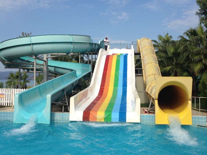 Water Slides in the Water Park. Triple Aqua Slide Stock Photo - Image ...