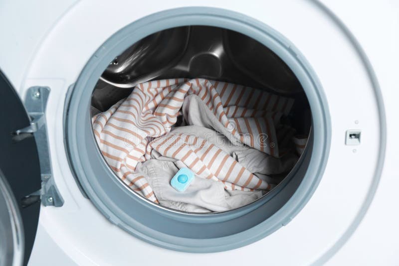 Water Softener Tablet on Clothes in Washing Machine Stock Photo - Image ...