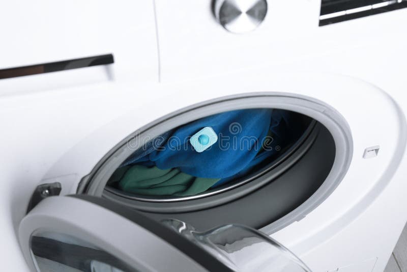 Water Softener Tablet on Clothes in Washing Machine Stock Image - Image ...