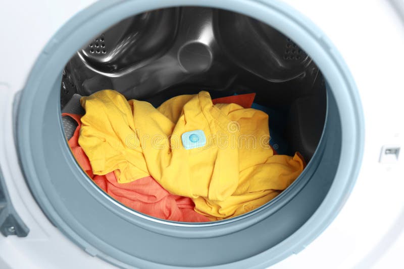 Water Softener Tablet on Clothes in Washing Machine Stock Photo - Image ...