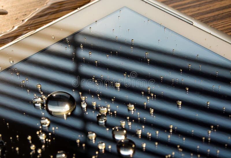 Water Spilled Onto the Tablet Stock Photo - Image of drops, spilled ...