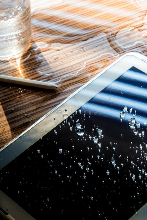 Water Spilled on the Tablet, Drops of Water on Tablet Screen Stock ...
