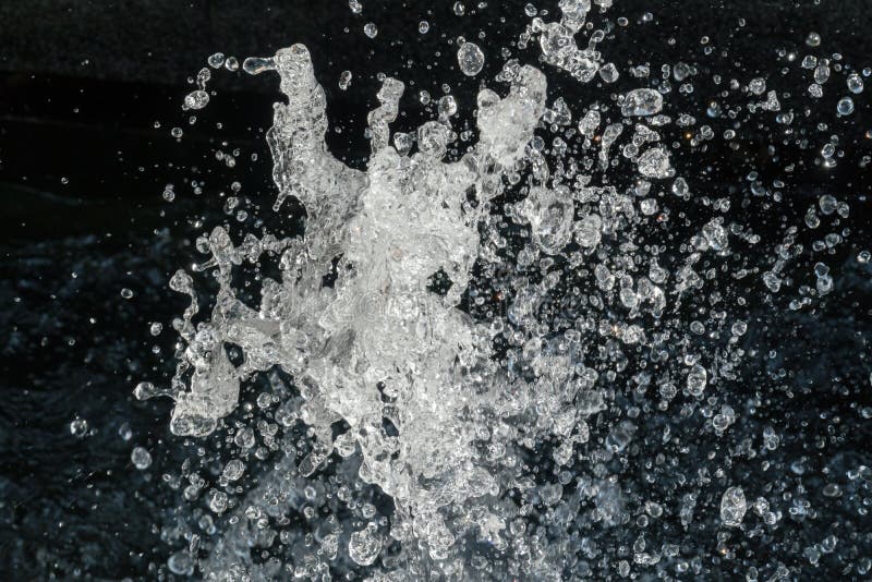 Water Splash on Black Background.Stylish Water Splash. Isolated on ...