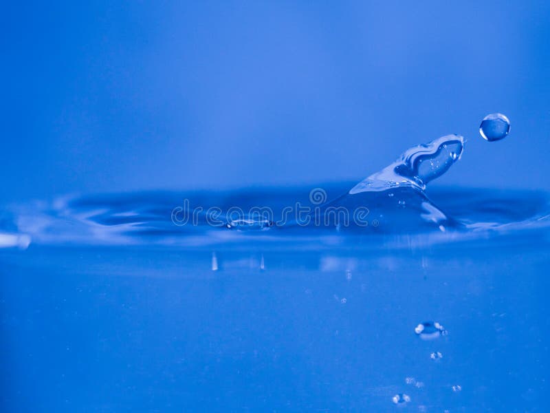 Water Splash Blue Color Drop Coming Out Stock Photos - Free & Royalty ...