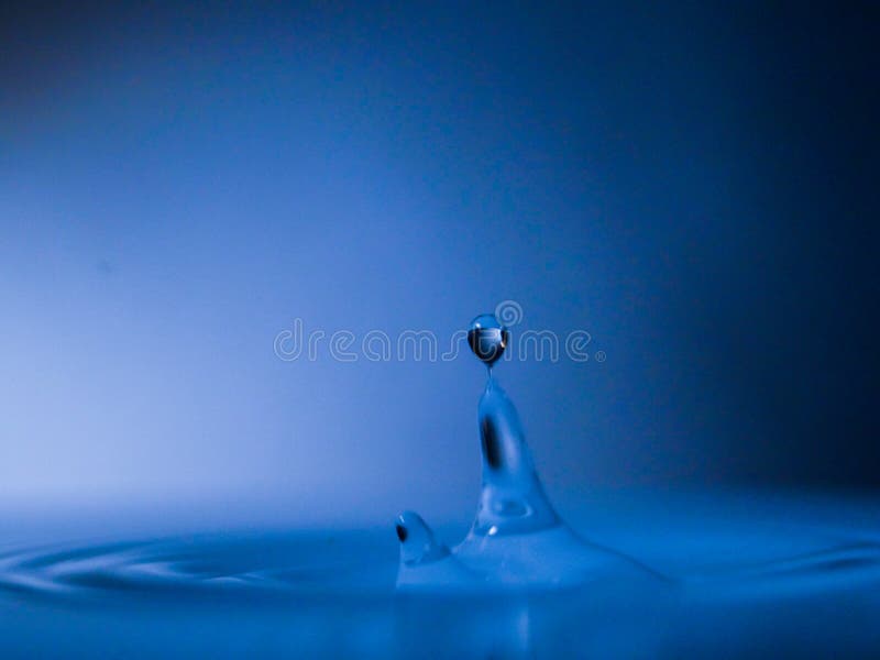 Water Splash Blue Color with a Drop of Water Stock Image - Image of ...