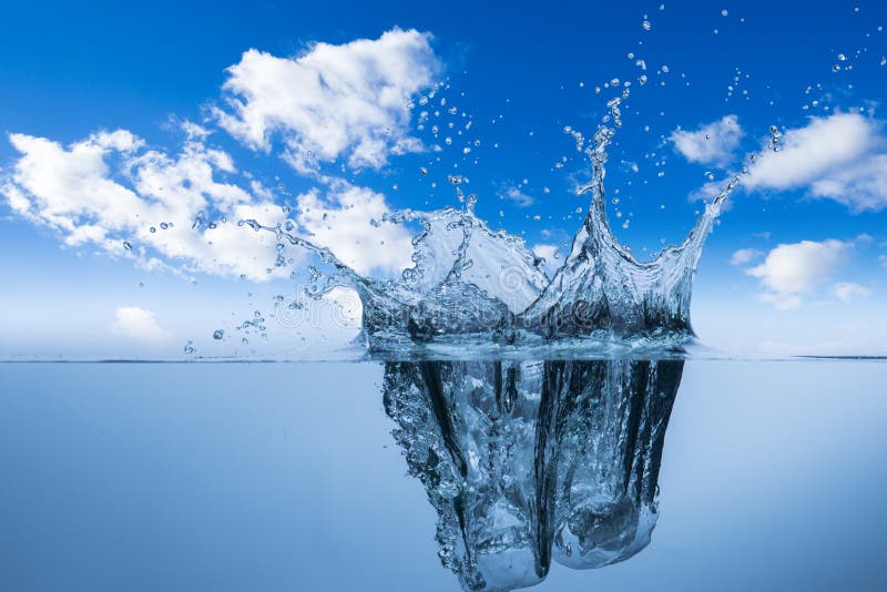 Water splash and blue sky stock image. Image of abstract - 44835993