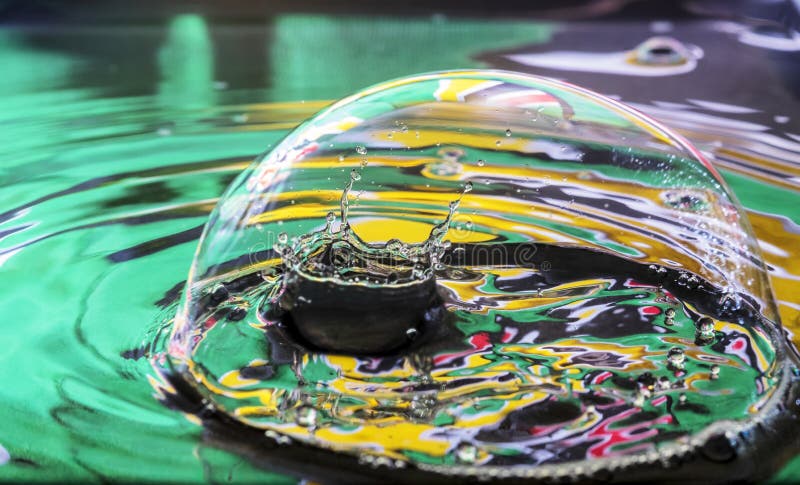 Water splash within bubble stock image. Image of fluid - 71826857