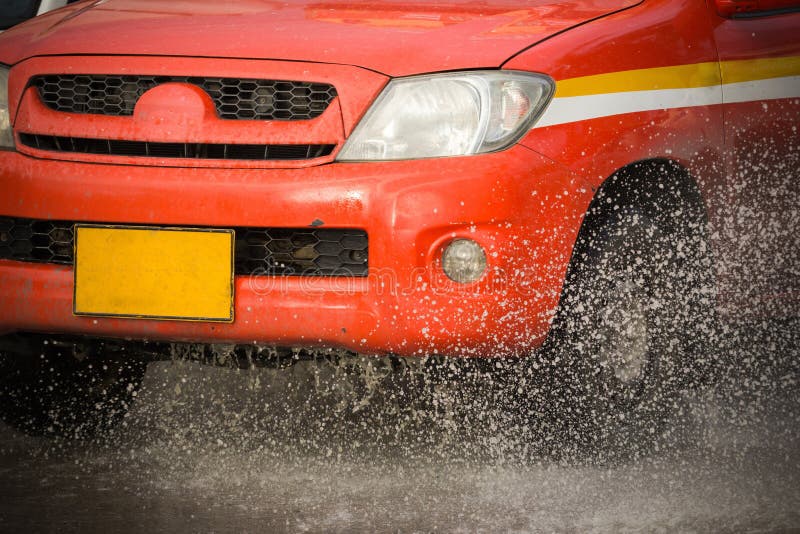 Water Splash with Car on Flooded Road after Rains Stock Photo - Image ...