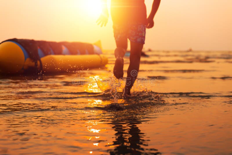 Splash from a Child Jumping in a Rain Puddle Stock Photo - Image of ...