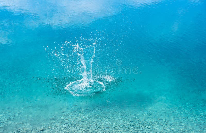 Water splash in a lake stock photo. Image of mountain - 170186638