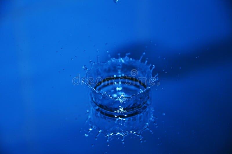 Water Splash in Dark Blue Color Stock Photo - Image of ripple, black ...