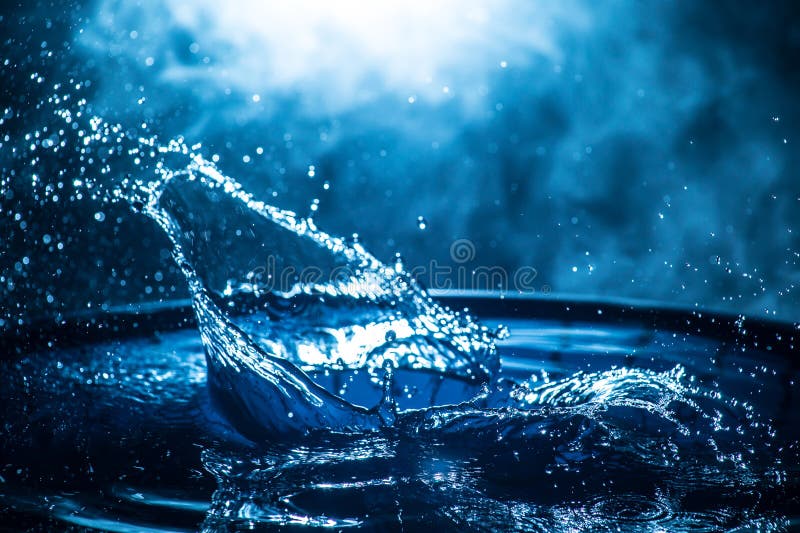 Water Splash on Dark Foggy Background. Selective Stock Photo - Image of ...