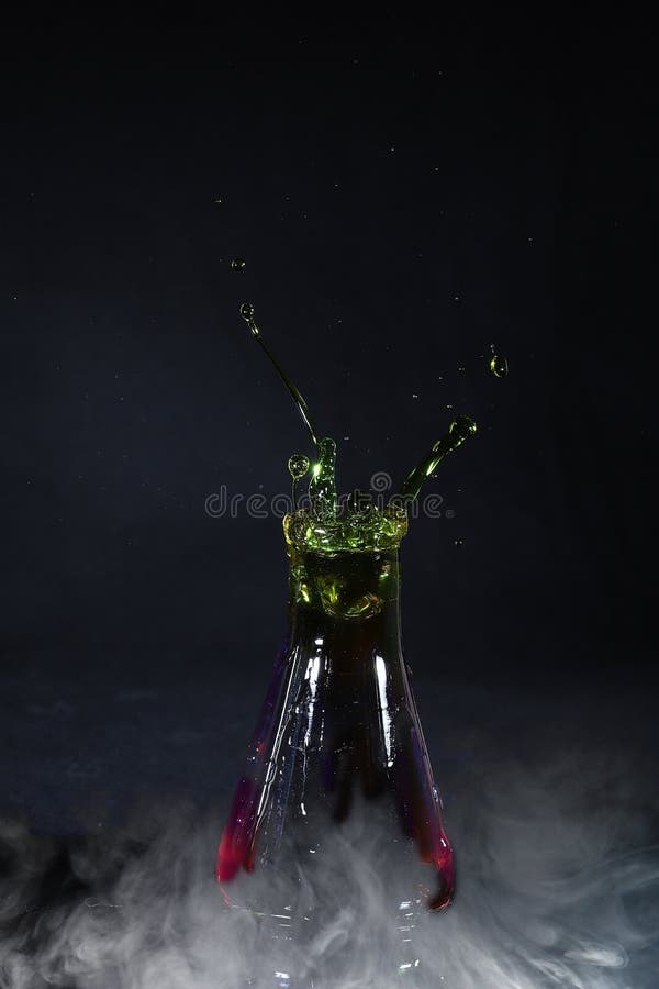 Water splash in the flask stock photo. Image of high - 151643518