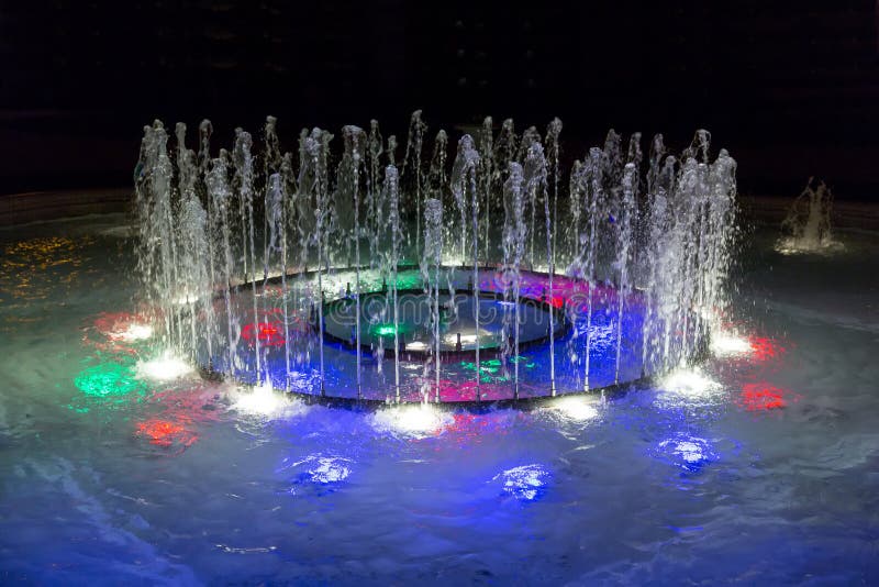 Water splash in the night stock photo. Image of pressure - 202499504