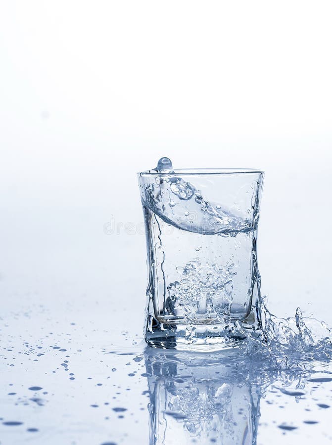 A water splash in a glass stock image. Image of mirror - 28503803