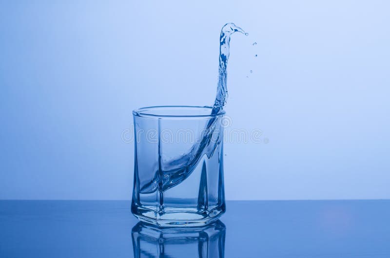 Water splash in a glass stock photo. Image of drinking - 85869762