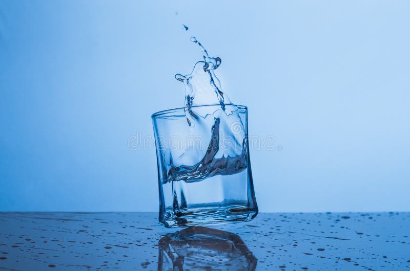 Water splash in a glass stock image. Image of glass, mineral - 86466653
