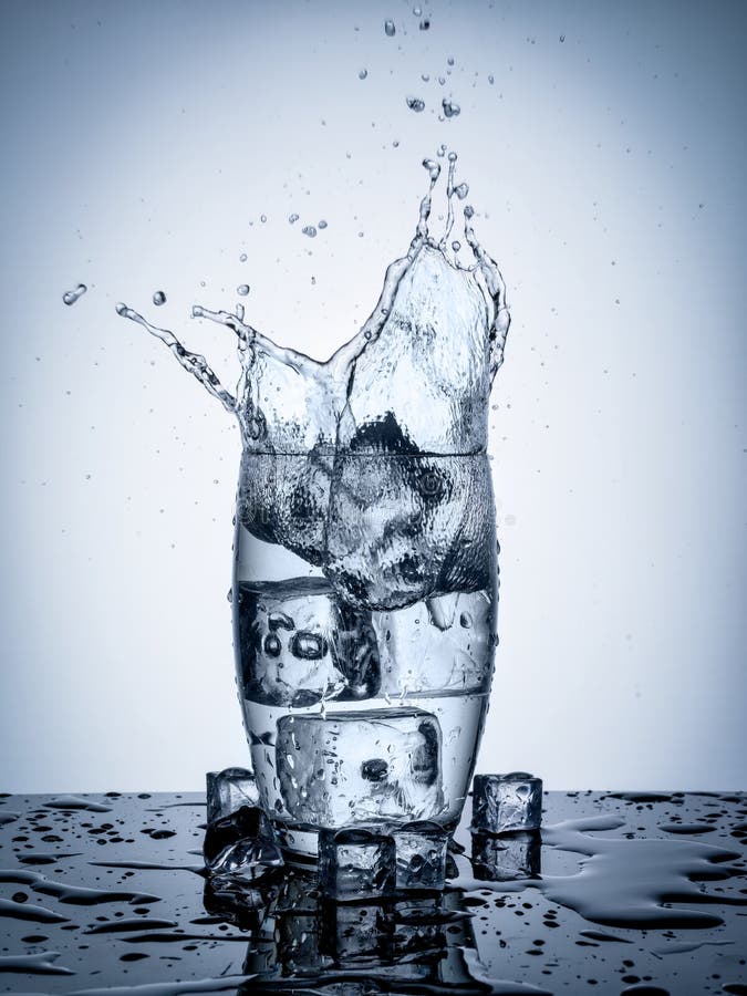 Water Splash in Glass with Ice Cubes Stock Photo - Image of bubble ...
