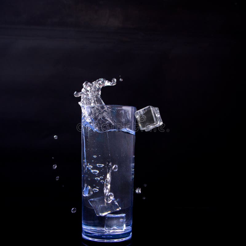 Water Splash in Glass Isolated on Black Bacgraund Stock Photo - Image ...