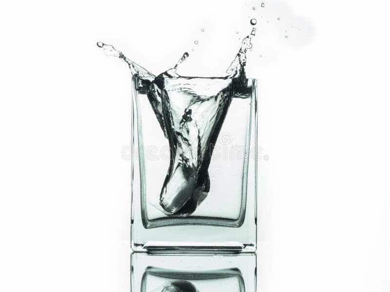 Water Splash in Glass Isolated on White Background Stock Image - Image ...