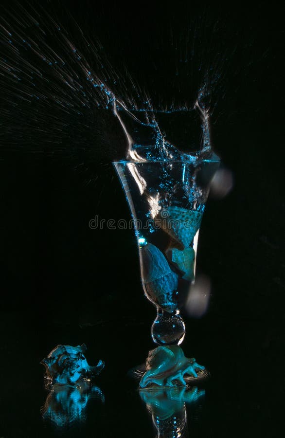 Water splash from a glass stock photo. Image of closeup - 77969020