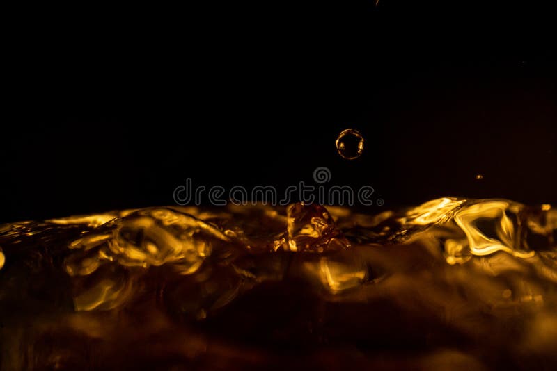 Water Splash, Golden Water Splash Isolated on Black Background,water ...