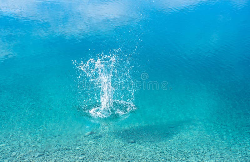 Water splash in a lake stock image. Image of wave, fall - 168139837