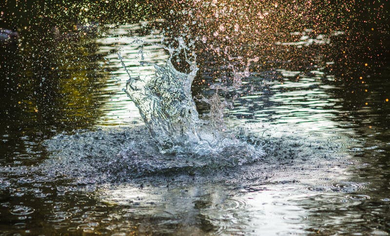 Water Splash stock image. Image of sunset, drops, water - 59575219