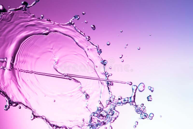 Water Splash on a Purple Color Stock Photo - Image of purple, blue ...