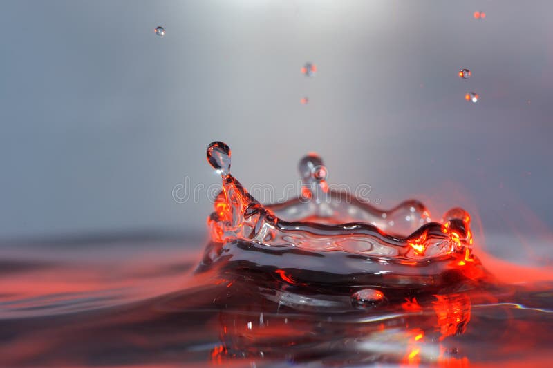 Water Splash with Red Reflection Macro Stock Photo - Image of splash ...
