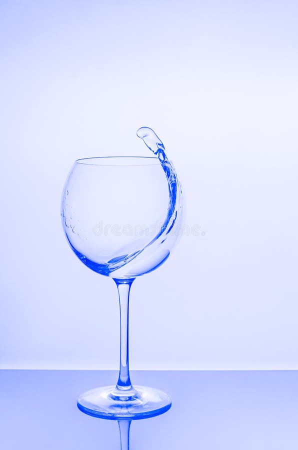 Water Splash in Round Glass Stock Photo - Image of liquid, color: 86514018