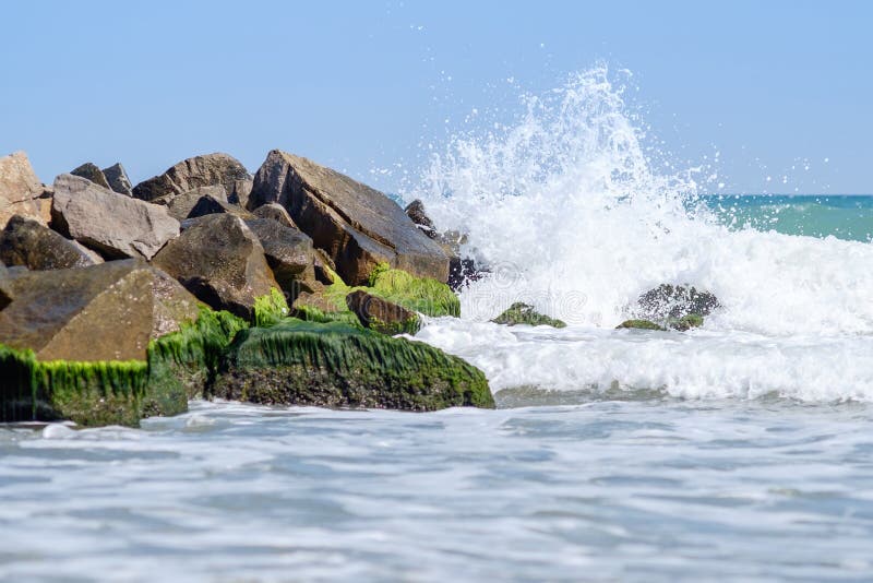 Water Splash on Stone Beach 5 Stock Image - Image of spray, rock: 90211537