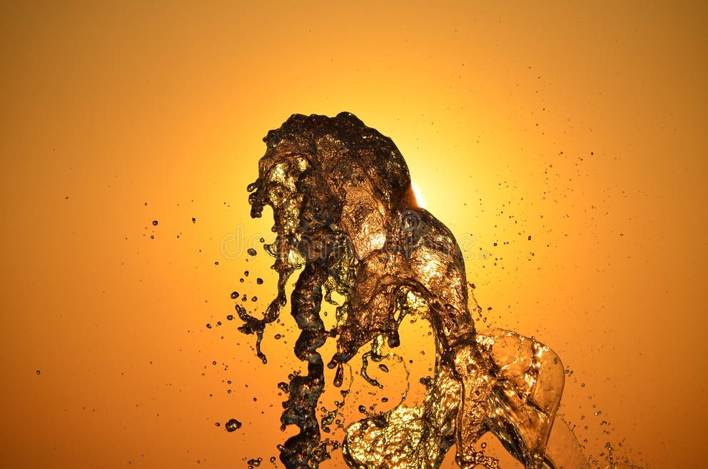 Water splash on sunset. stock image. Image of abstract - 104331151