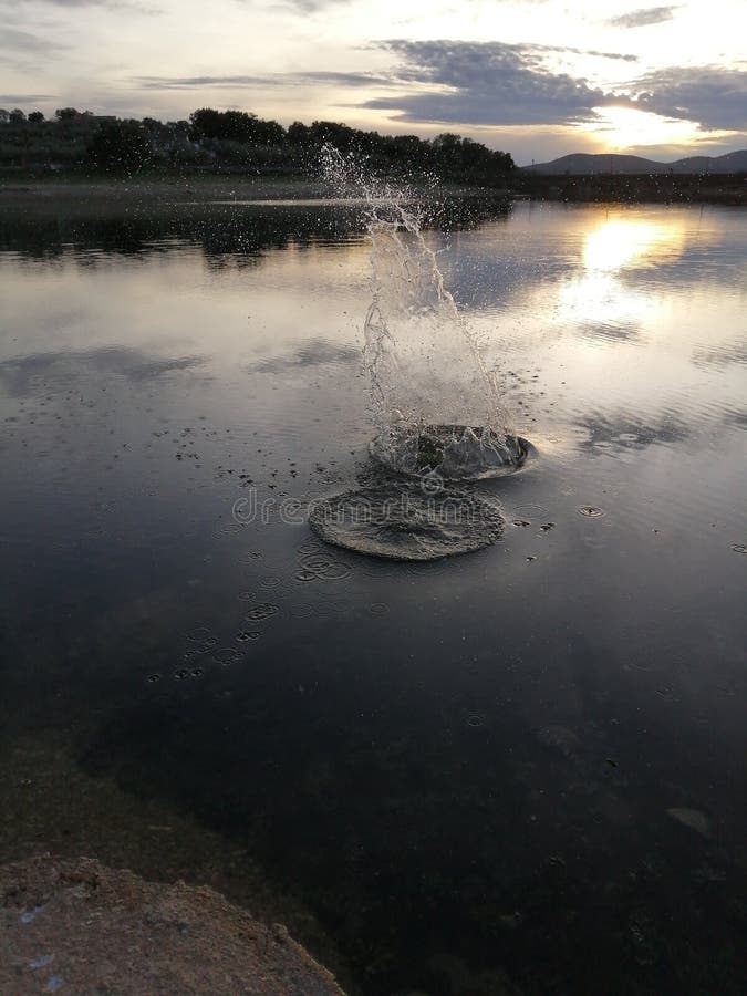 709 Stone Throwing Water Stock Photos - Free & Royalty-Free Stock ...