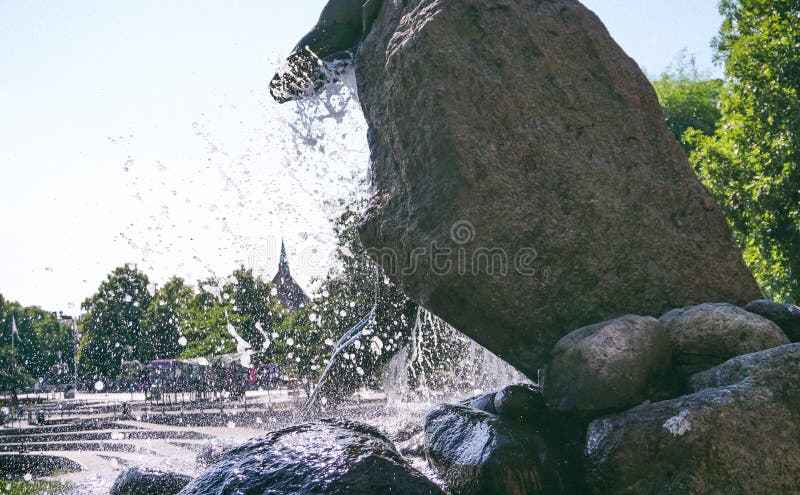 Water Splashes Against a Rock Stock Photo - Image of mountain, covered ...