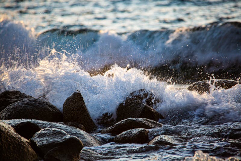 Water Splashes Against Rocks, Troubled Sea, Spray Stock Photo - Image ...